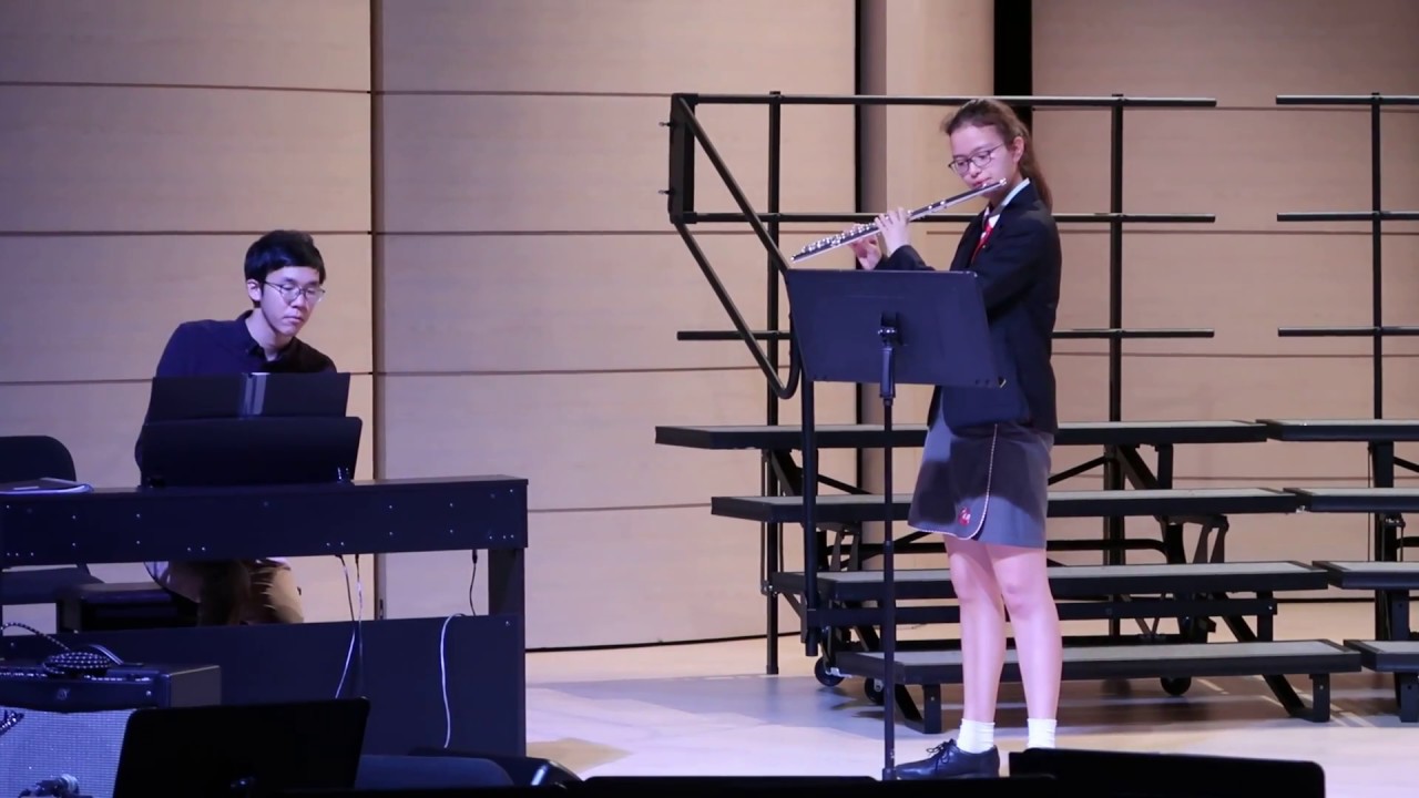 Sarah playing flute at the Kellett summer concert, 2018-06-13 - YouTube