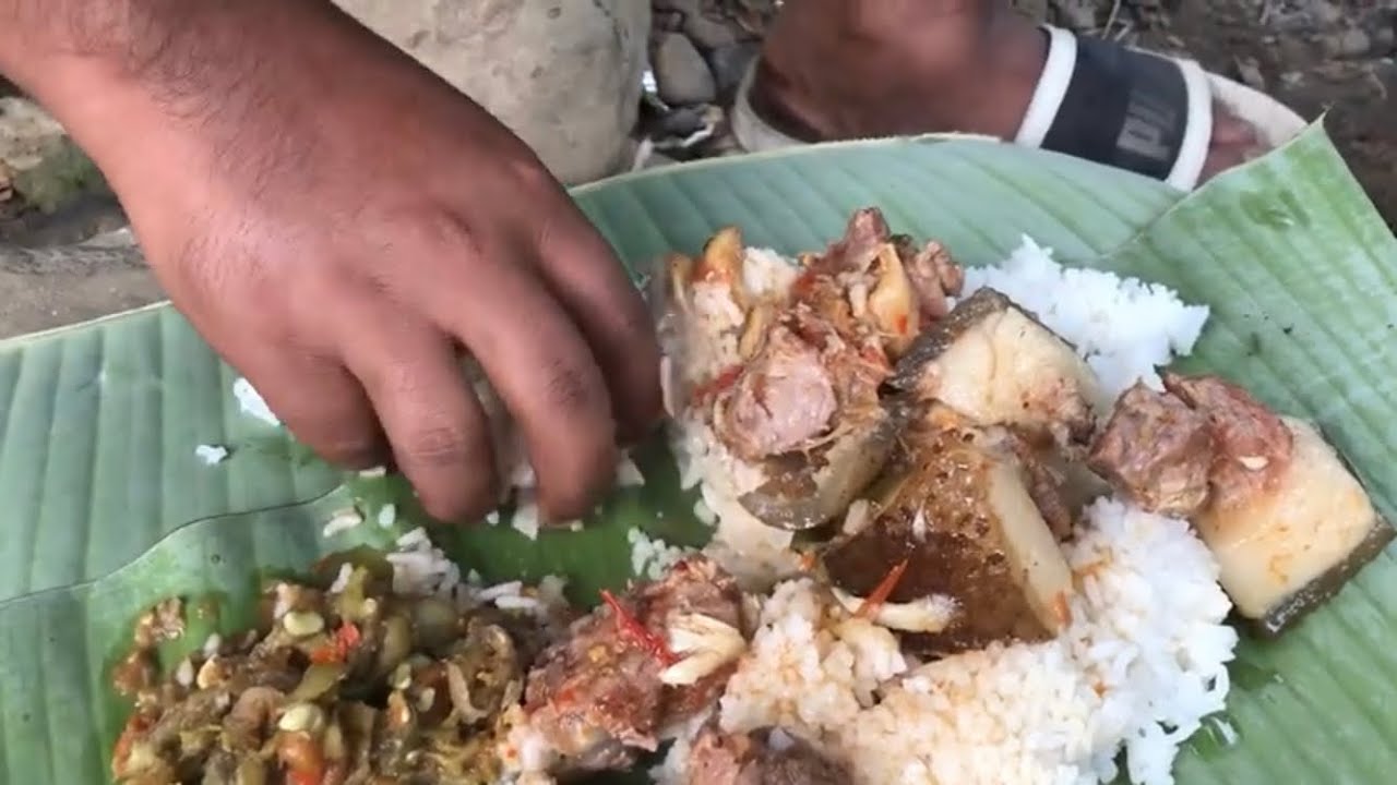 cooking pork at river side - YouTube