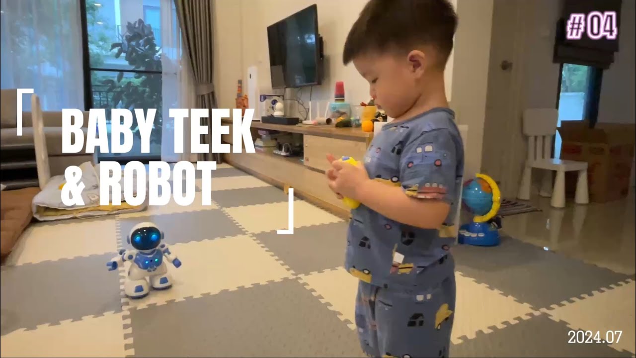 @TickledTEEK Baby TEEK with toy robot. - YouTube