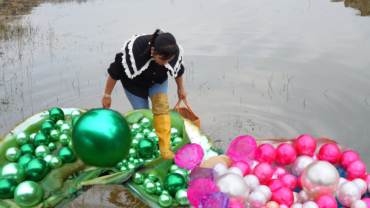 The girl picked up the sparkling pink clams, and the charming pearls ...