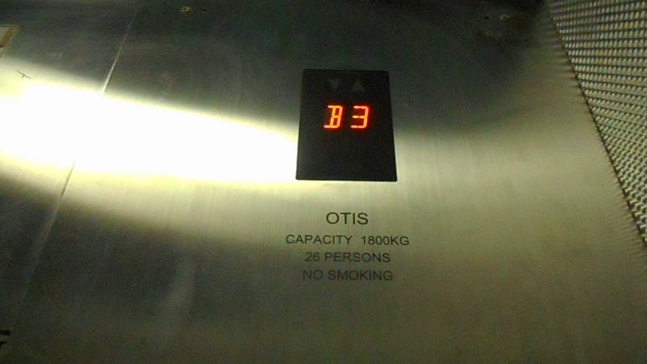 EPIC Otis high speed fireman lift at Swissotel the Stamford - YouTube