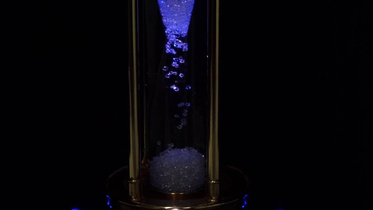 De Beers Diamond Hourglass.Over 2000 rough diamonds as the grains ...