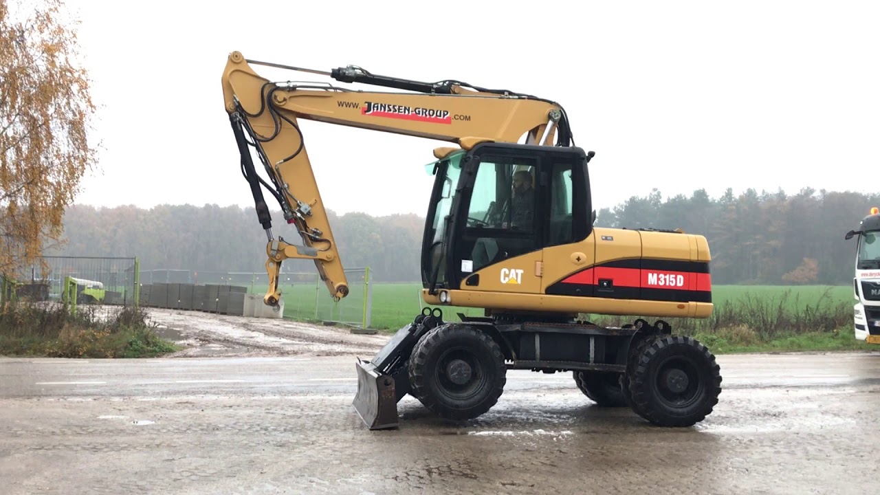 Caterpillar M313D, year 2008 (Refnr.: BM2689) - YouTube