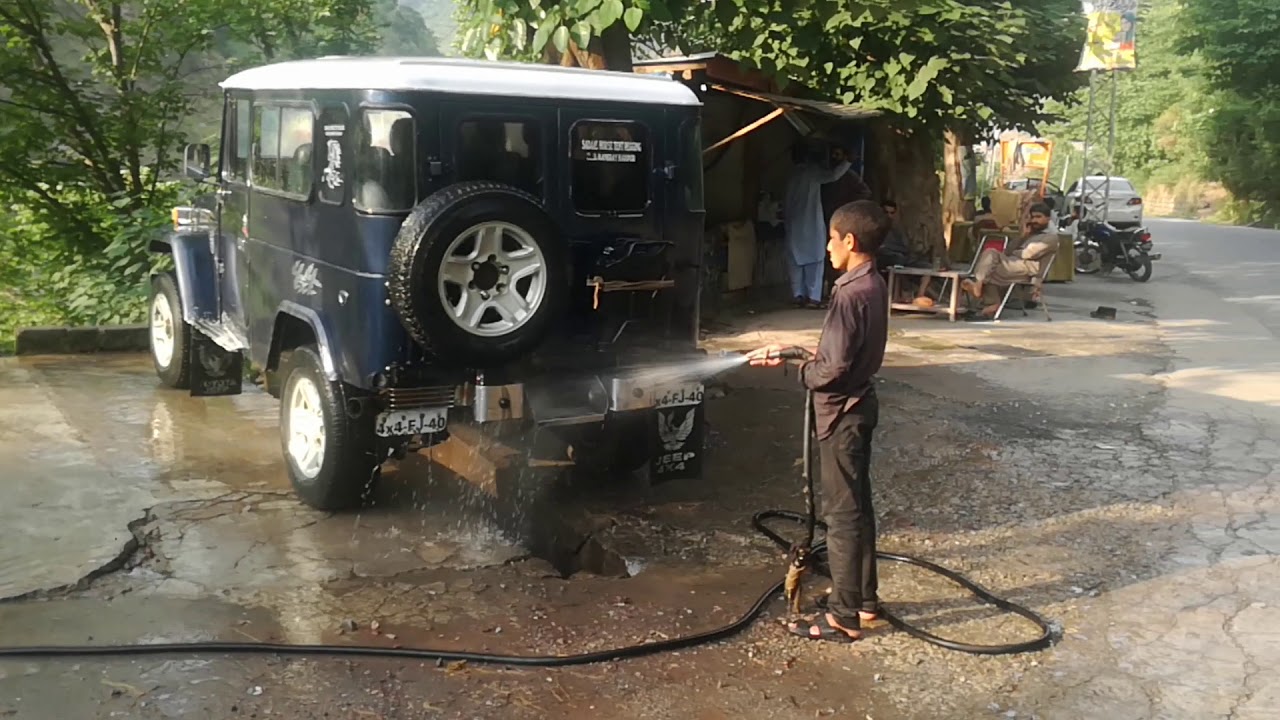 Beautiful View of a boy washing Jeep roadside on Neelum Road. - YouTube