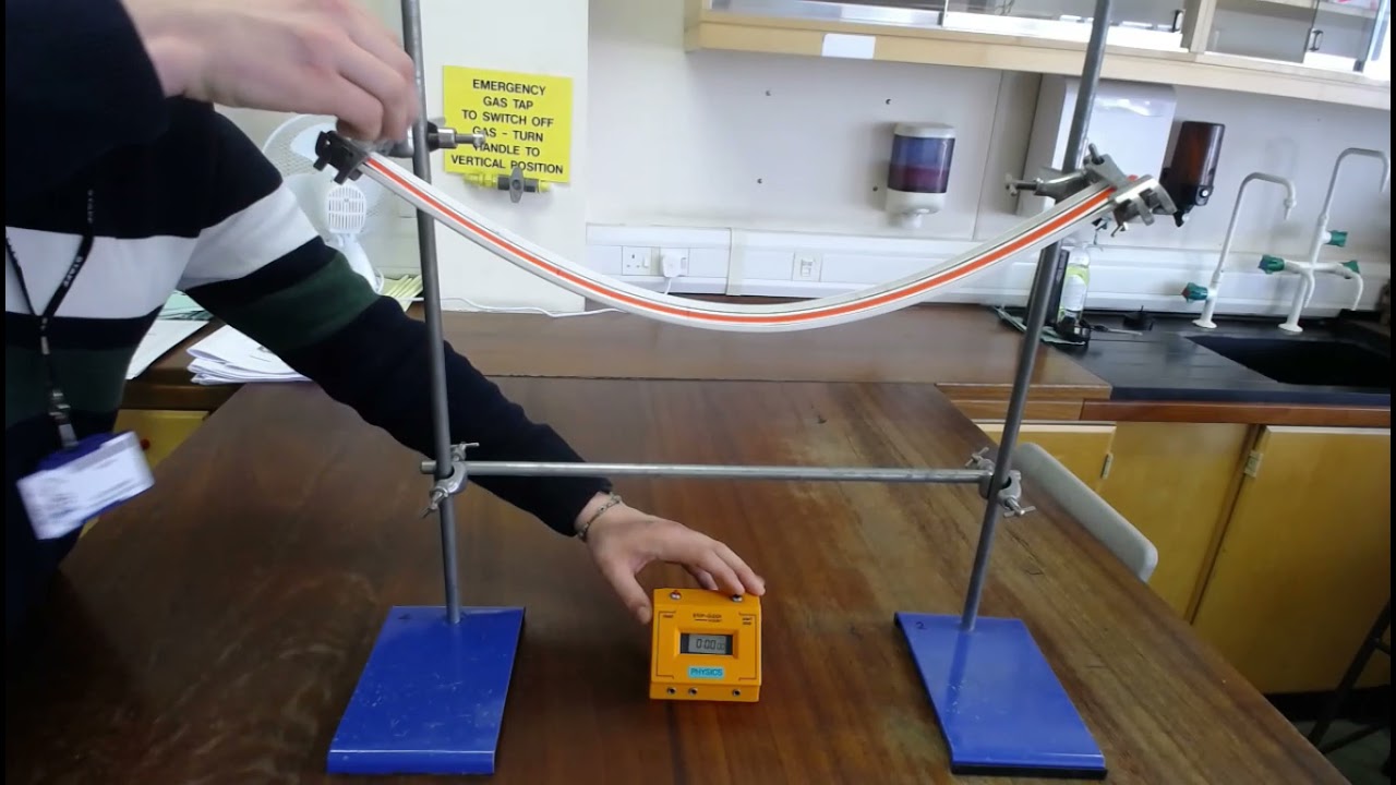 Measuring the Speed of a Marble on a Curved Track - YouTube