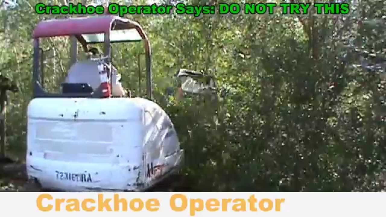 Crackhoe Operator clearing brush around our old barns ~ Fast Motion ...
