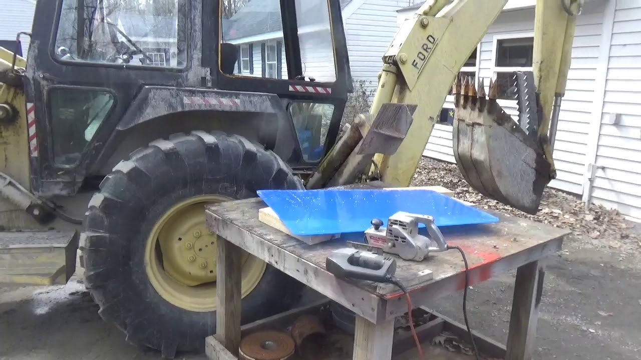 Glass replacement on the 550 Ford TLB. - YouTube