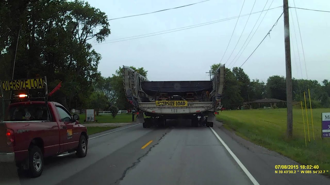 Oversize load vs trees - YouTube