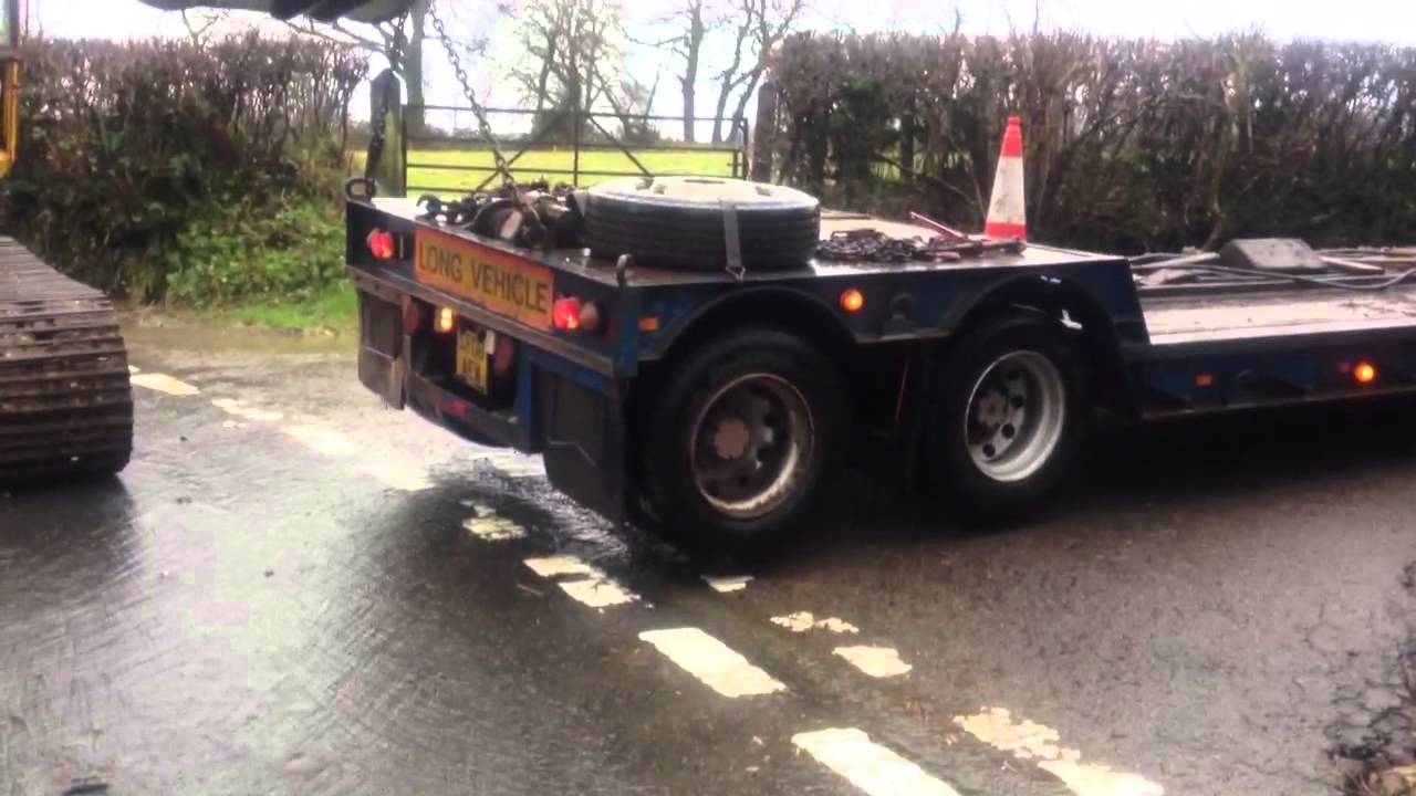 How to move a low loader round a corner - YouTube