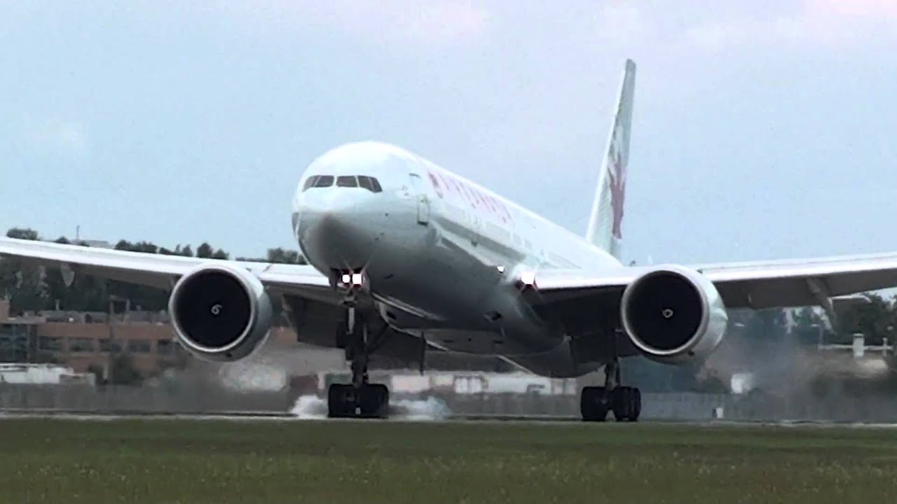 Air Canada 77W landing on 24L at YUL - YouTube