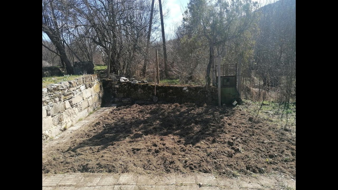 Preparation of a small plot for the upcoming crops growing season ...