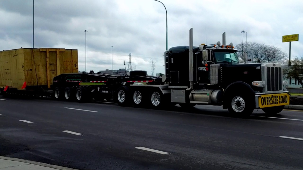 Redhawk Global | 70 Ton Main Press | 13 Axle RGN | Super Load - YouTube