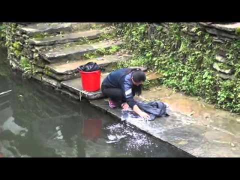 Washing clothes in the creek - YouTube