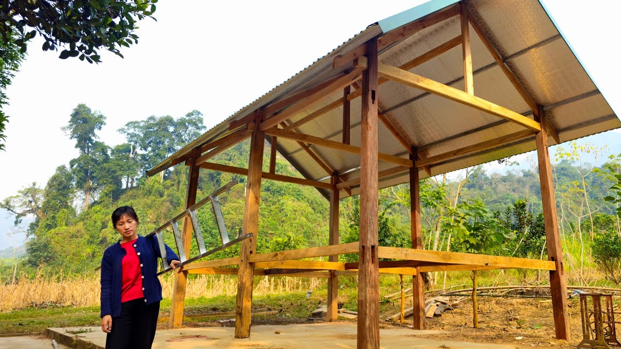 How a girl builds a wooden house - assembling the house frame and ...