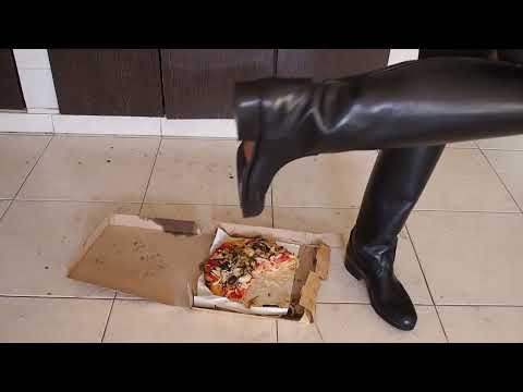 Classic riding boots and pizza