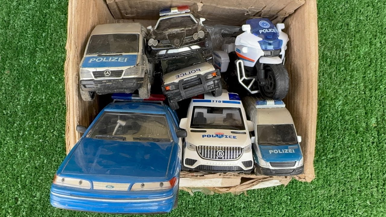 Box full of realistic diecast models police cars - YouTube