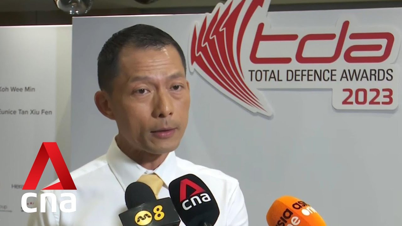 Over 200 people, groups receive Total Defence Awards - YouTube