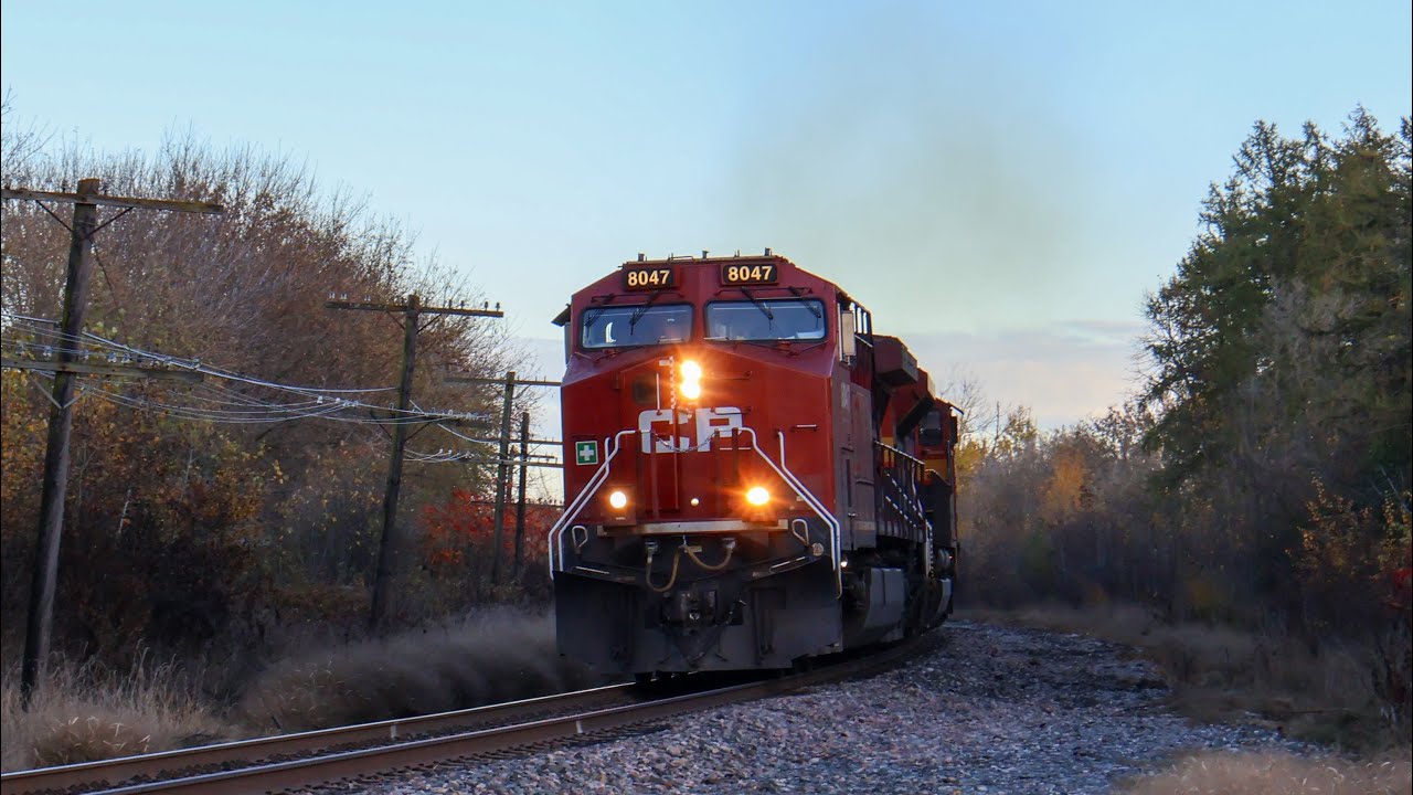 CPKC train 421-26 north throttles up at Nashville with CP 8027 & KCS ...