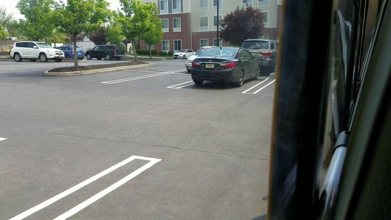 Backing Up Small Bus On A Parking Lot - YouTube