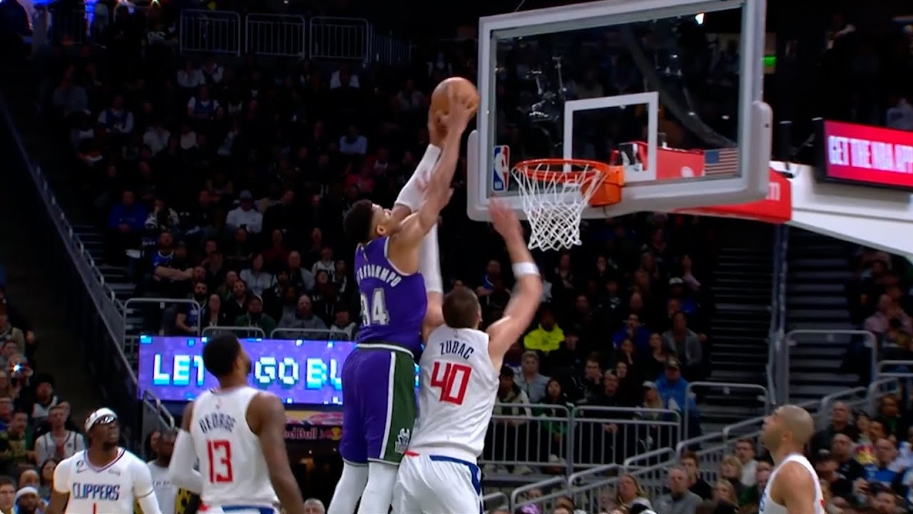 Giannis Antetokounmpo made the Bucks bench go crazy after this wild putback dunk over Ivica ...