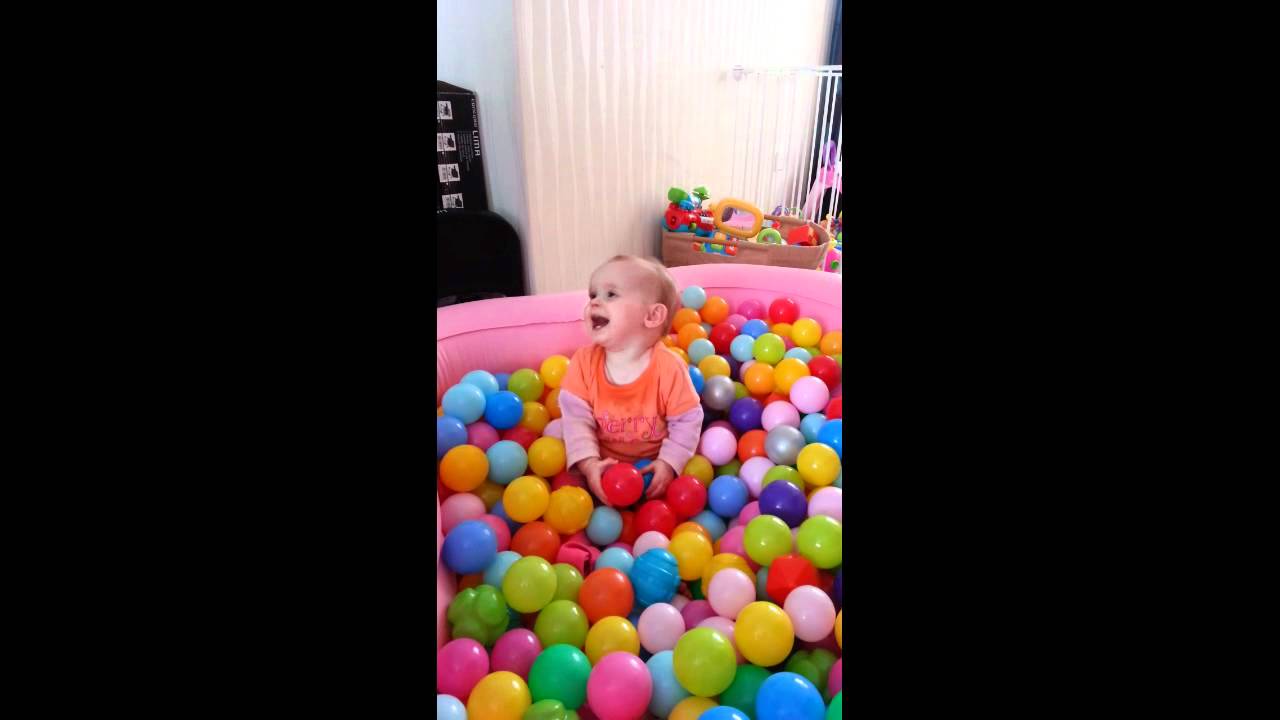 Cute baby laughing at ball juggling - YouTube