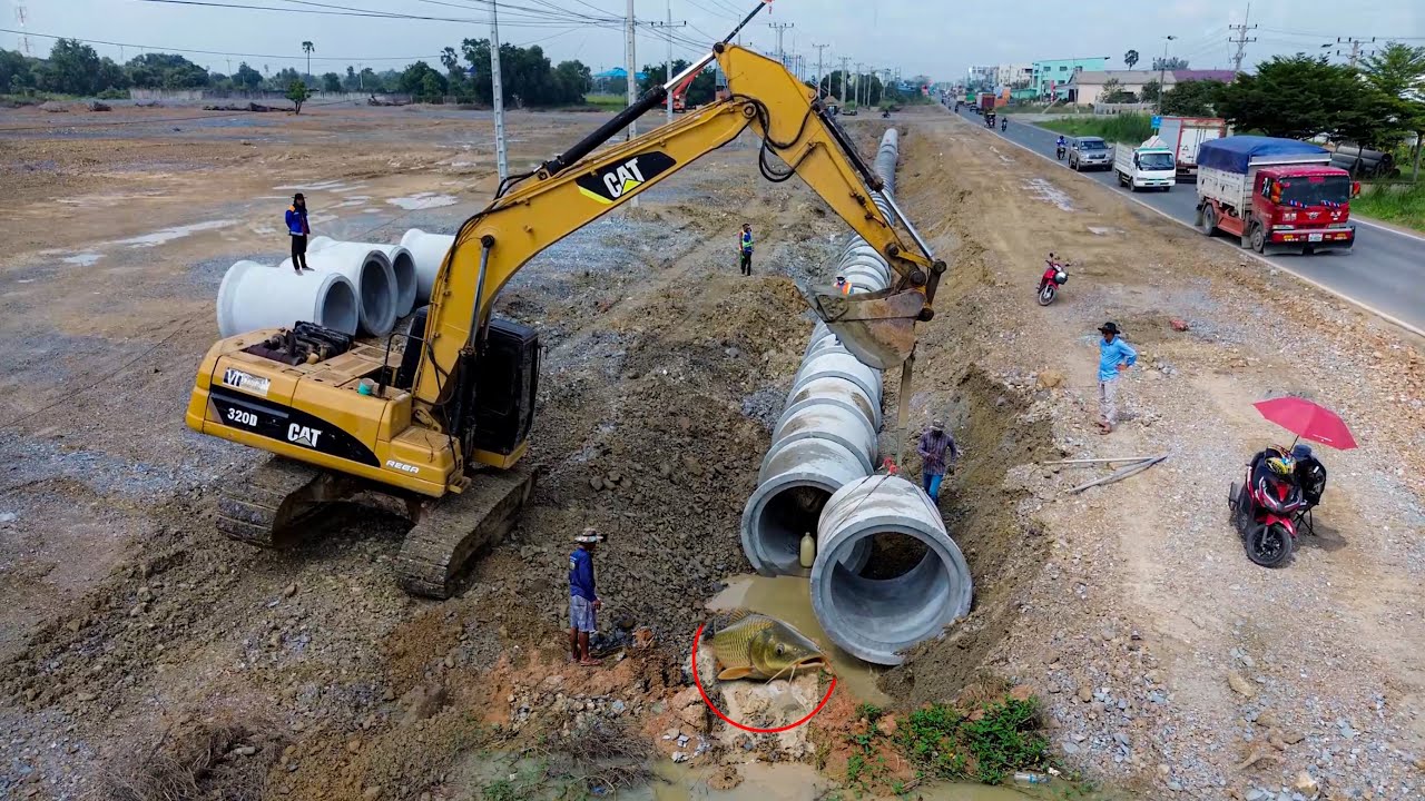 Successfully Drainage Construction!! Process Installing Concrete pipe using Caterpillar ...