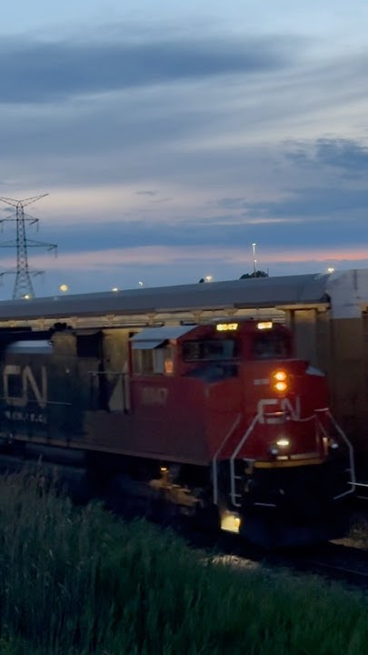 CN Q122 races CN M396 at snider west - YouTube