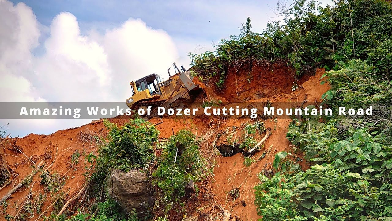 Bulldozer Cutting Mountain Road - YouTube