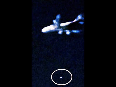 Two white balls flying parallel and faster than a plane! - YouTube