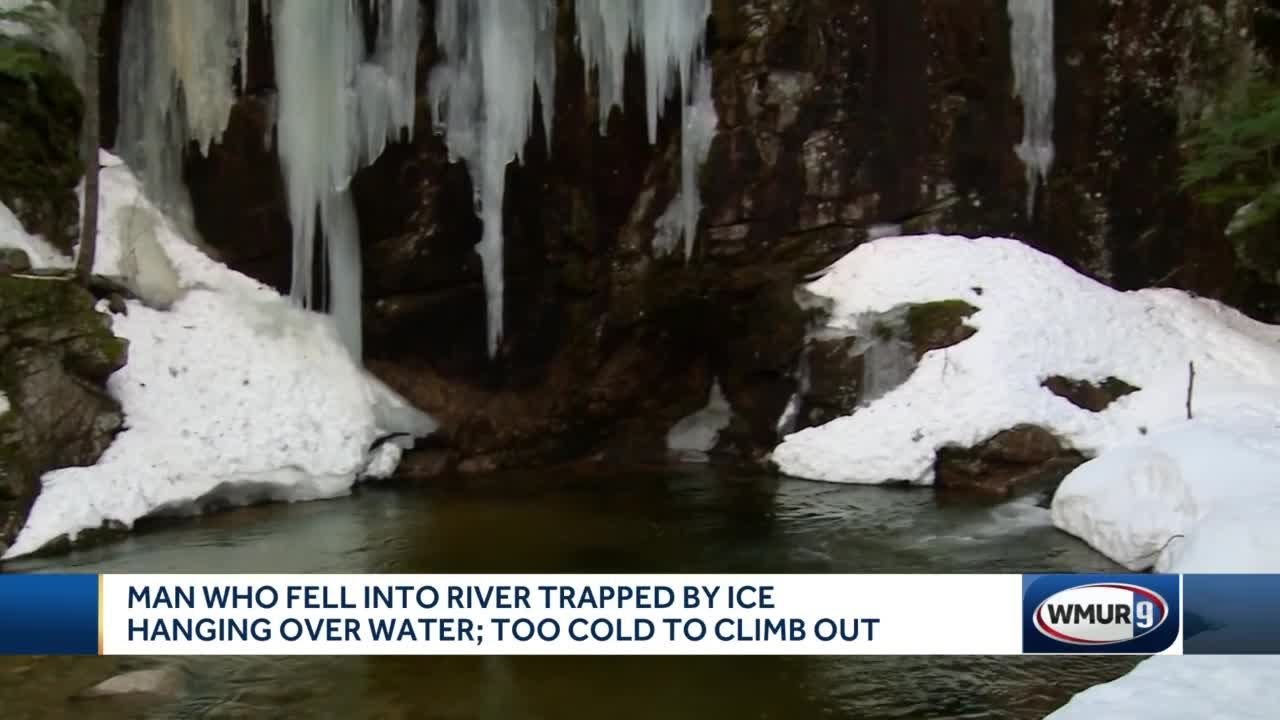 Man who fell into river trapped by ice hanging over water; too cold to ...