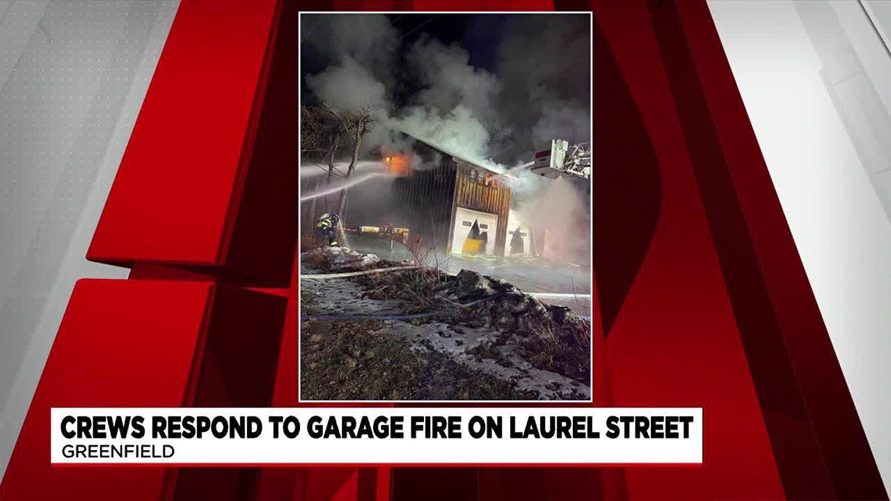 Crews respond to heavily involved garage fire in Greenfield - YouTube