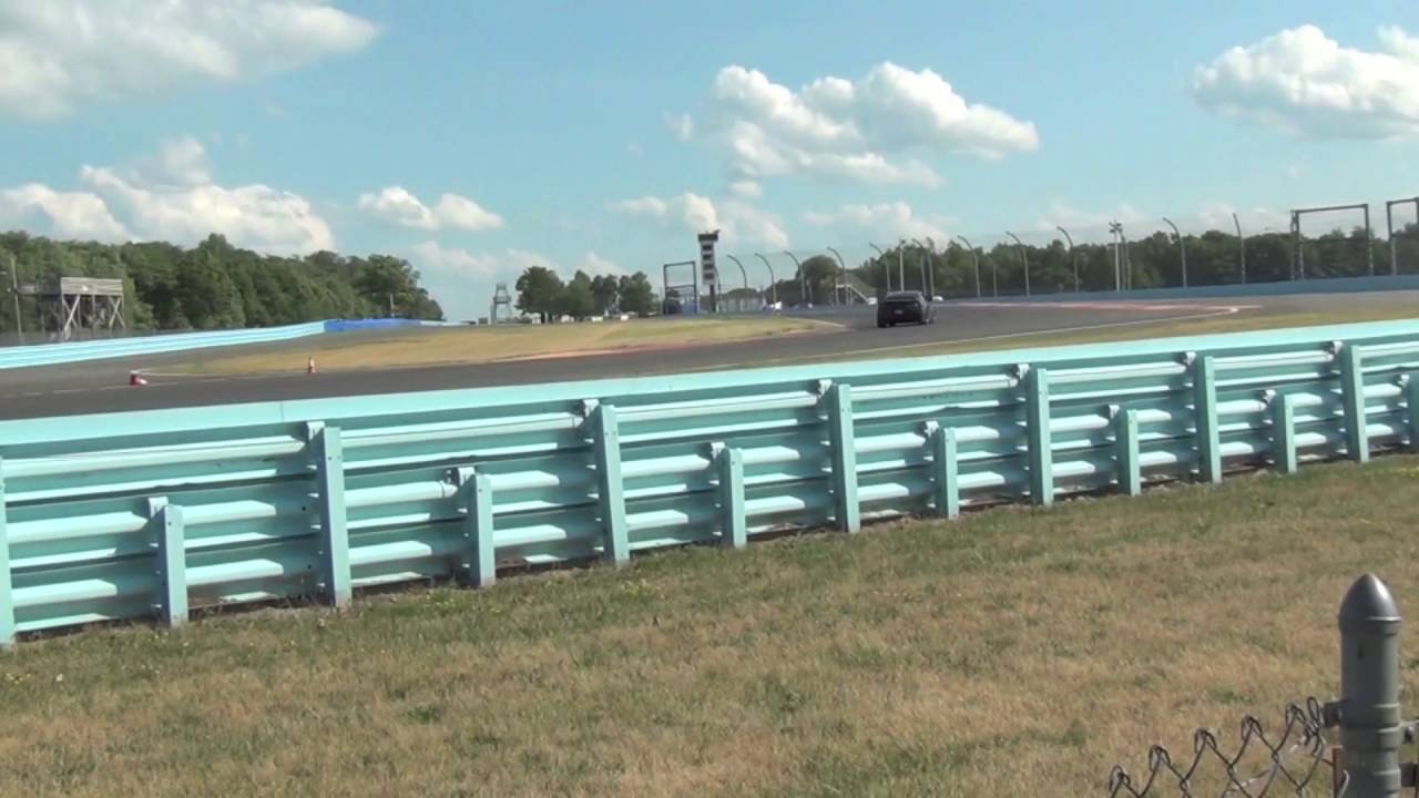 Cooking on the WGI back straight - Eric Rossini 2014 GTR black edition ...