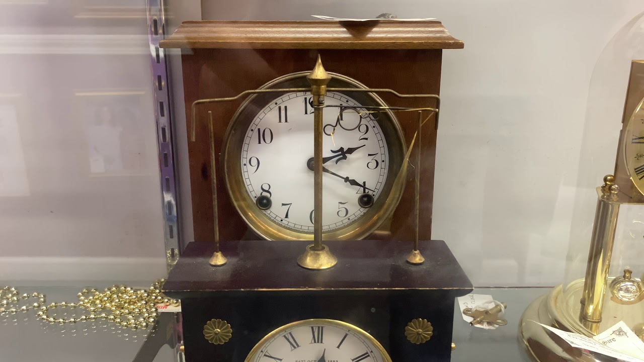 Interesting clock at a thrift shop - YouTube