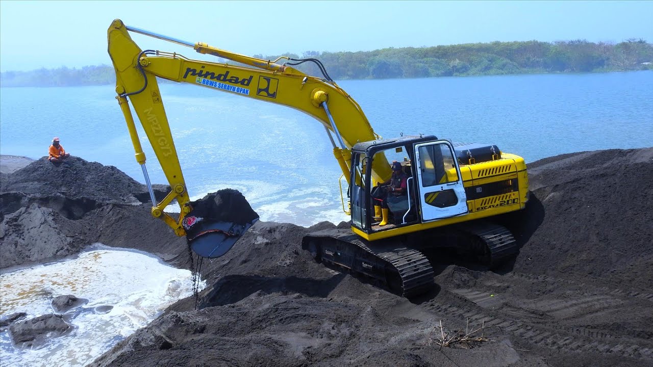 Pindad 200 Excavator Digging A Clogged River Estuary To The Ocean - YouTube