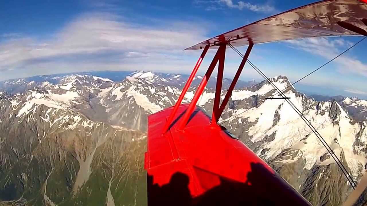 Red Cat Biplane Flights over Mt Cook, New Zealand - YouTube