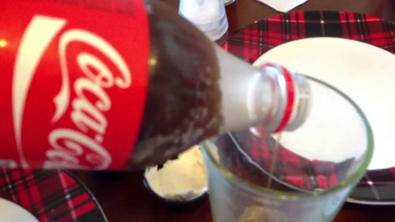 Coca-Cola Freezes When Opened - YouTube