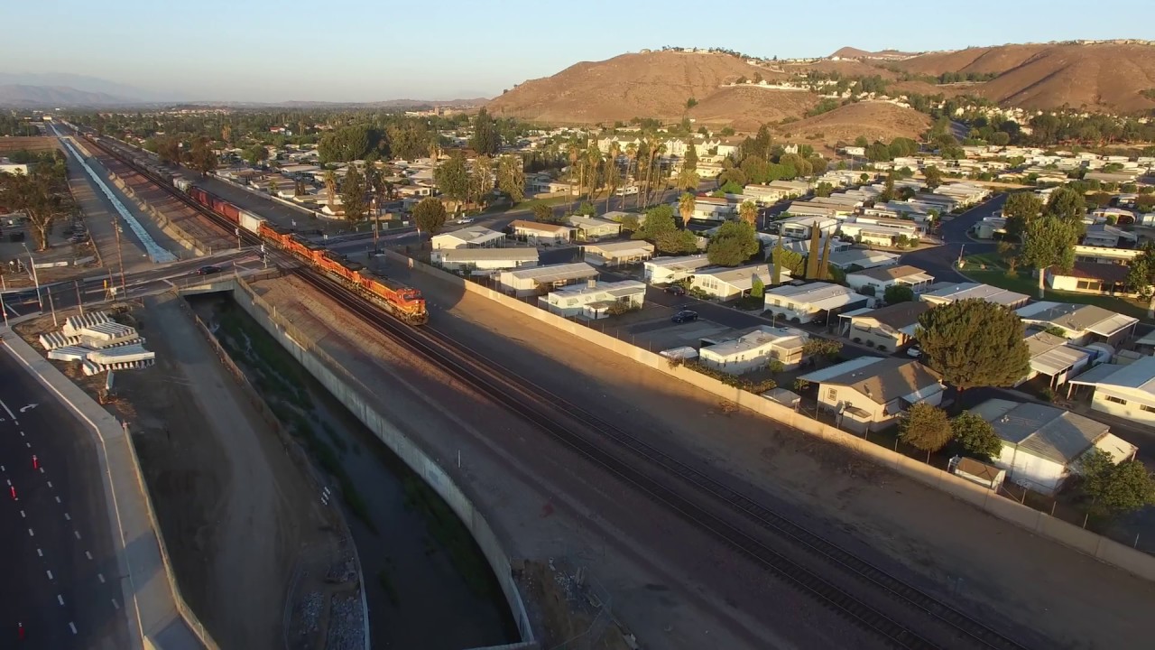 BNSF and Amtrak trains above Riverside - YouTube
