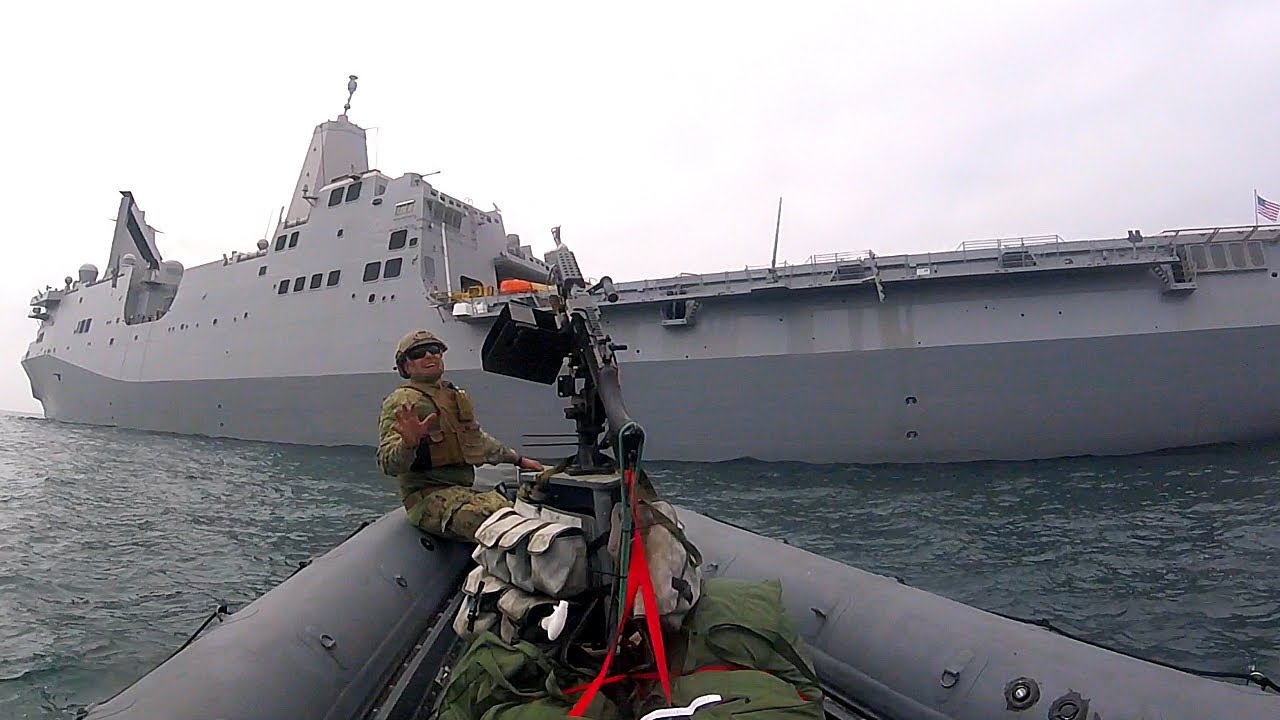 Huge Navy Ship Picks Up Small Boat - YouTube