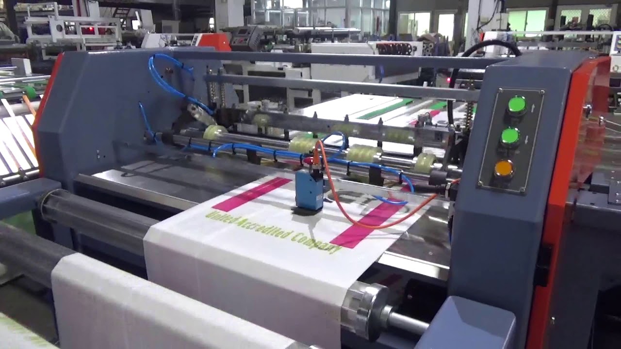 Automatic Bag Cutting & Sewing Machine TKCS-2012/EM/CH - YouTube