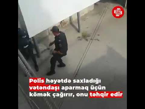 Polislər insanları döyür və təhqir edir.