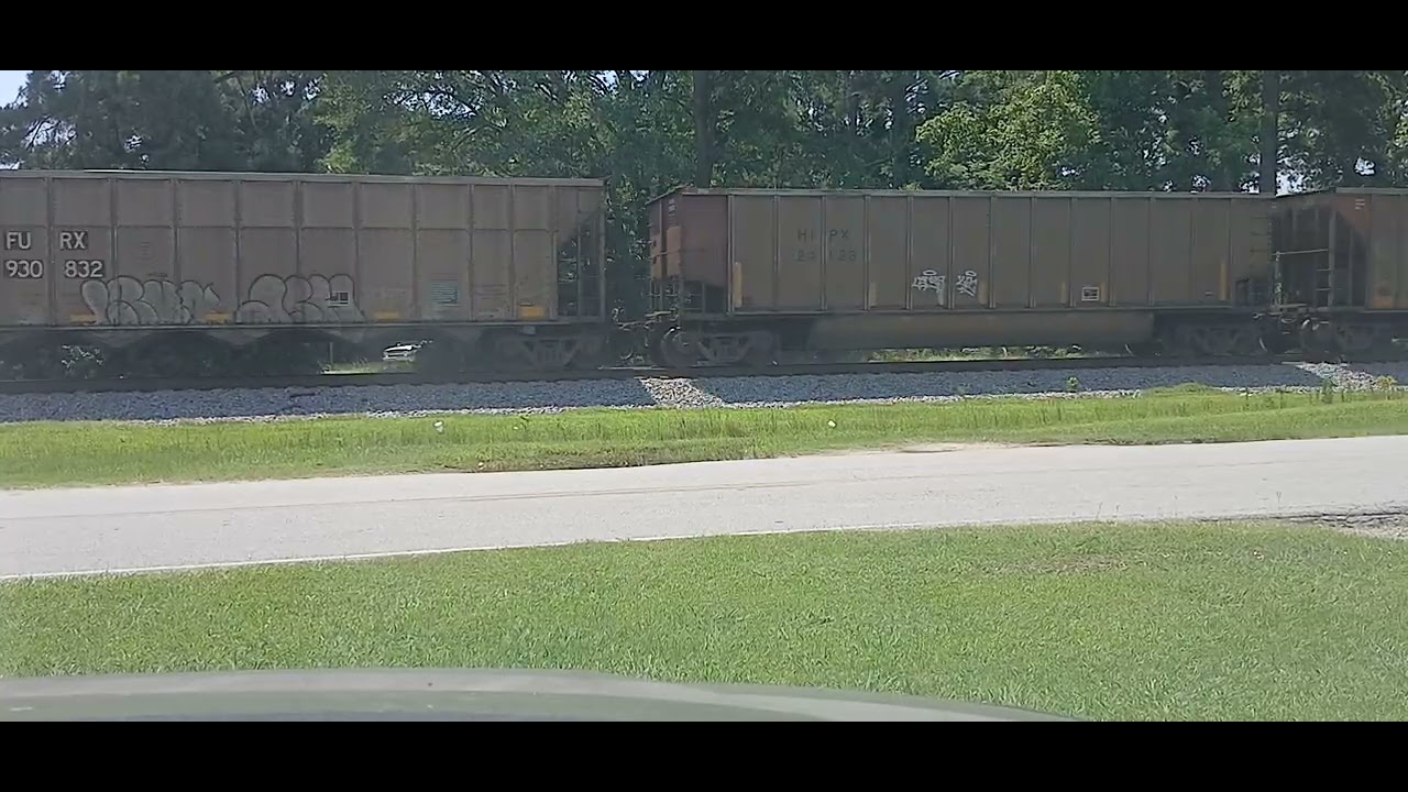 CSXT coal train going through lucama with a CSXT YN2 leading - YouTube