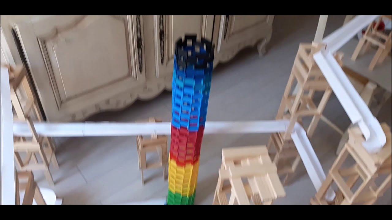course of giant paper marbles with a domino tower! - YouTube