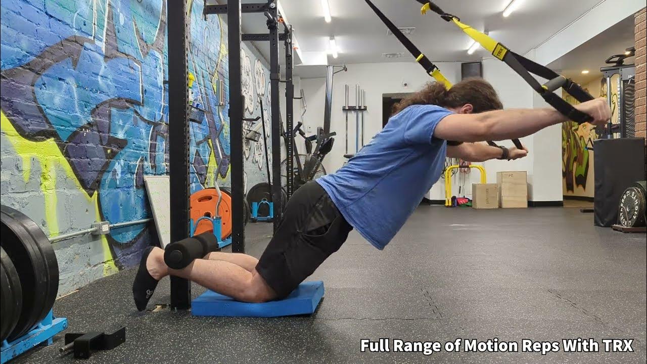 TRX Assisted Nordic Hamstring Curls - YouTube
