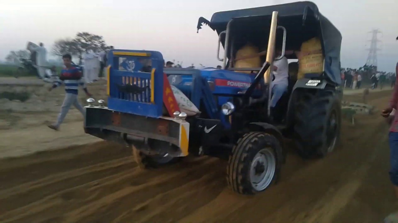 Powertrac Euro 60 Tractor pulling 2 harrow in Garhi Sampla competition ...