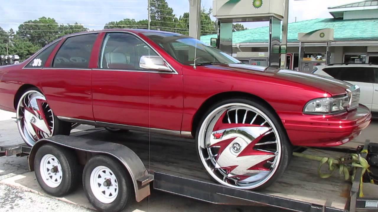 Kandy Red Chevy Caprice on 30" Dub Floaters - YouTube