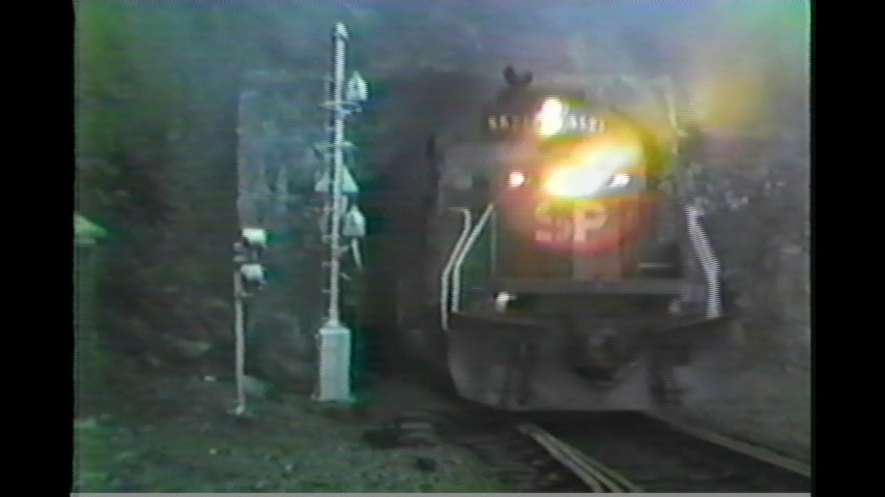 457. SOUTHERN PACIFIC SP 8621 exit tunnel # 6 Cruzatte Oregon on August 10 1985 with 8 freight ...