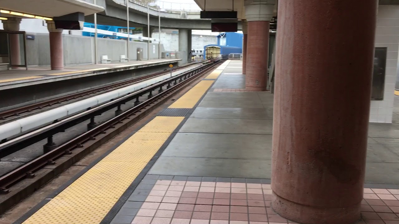 BART SFO Airport Train Arriving and Departing at Colma Station - YouTube