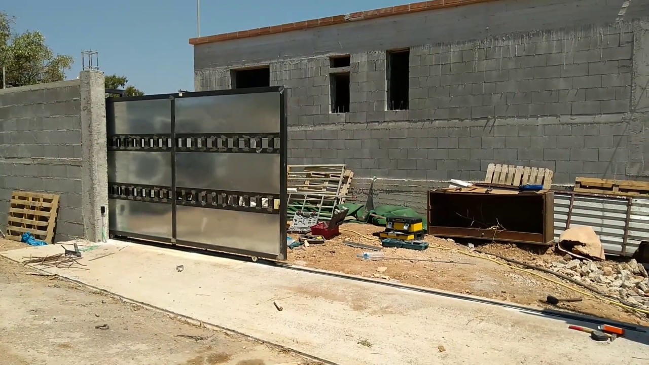 Τηλεσκοπική συρόμενη γκαραζοπορτα Νέα περαμος - YouTube