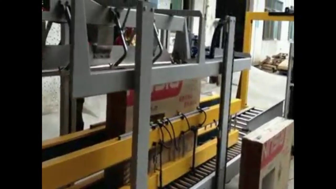 Assembly line:carton top sealing machine,strapping machine & stapling ...