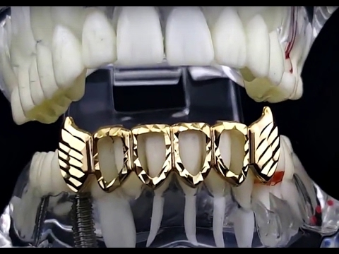 Diamond-Cut Vampire Fang Bottom Grillz Video - YouTube